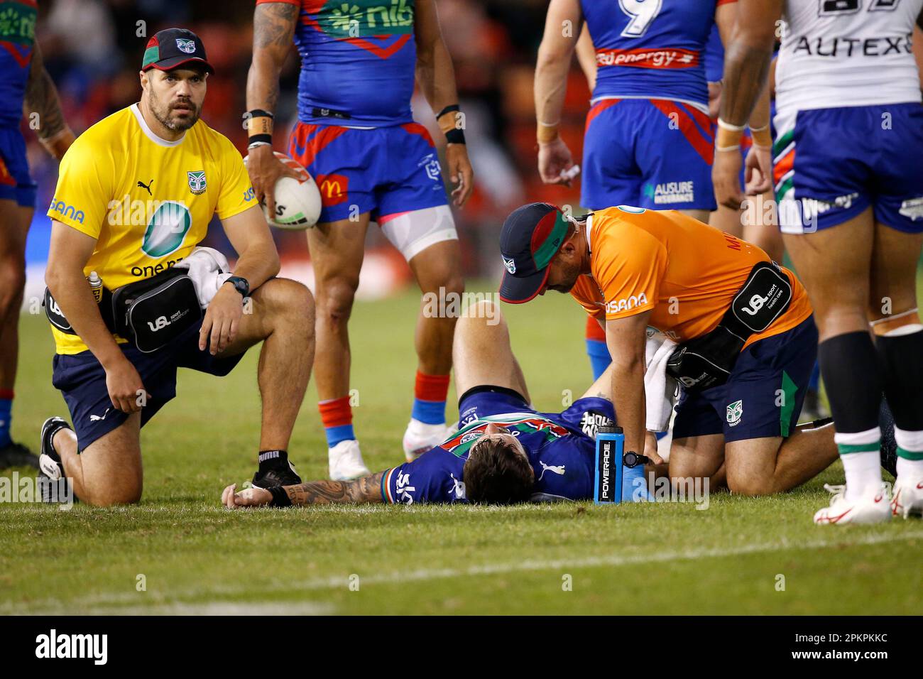 Wayde Egan of the Warriors lays on the ground after a head knock during ...