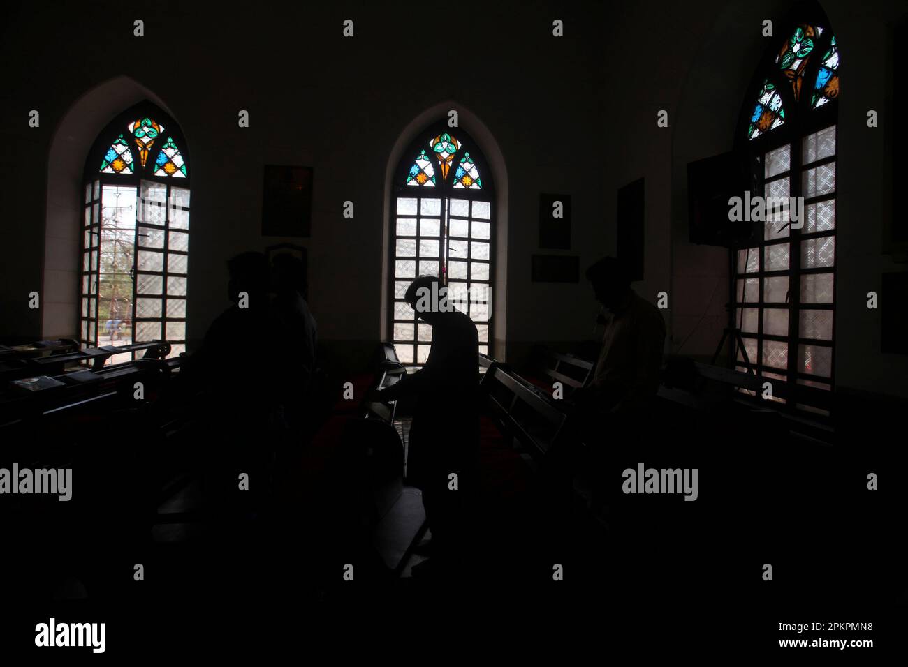Pakistani Christians attend Easter prayer during an Easter mass in St. John's Cathedral, Church ...