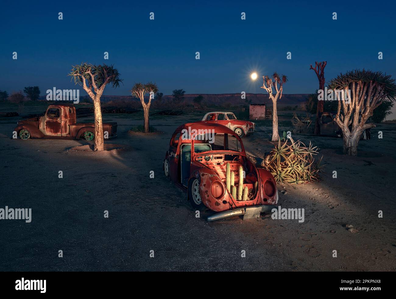 The full moon rises over the Klein Karasburg Mountains and old vintage ...