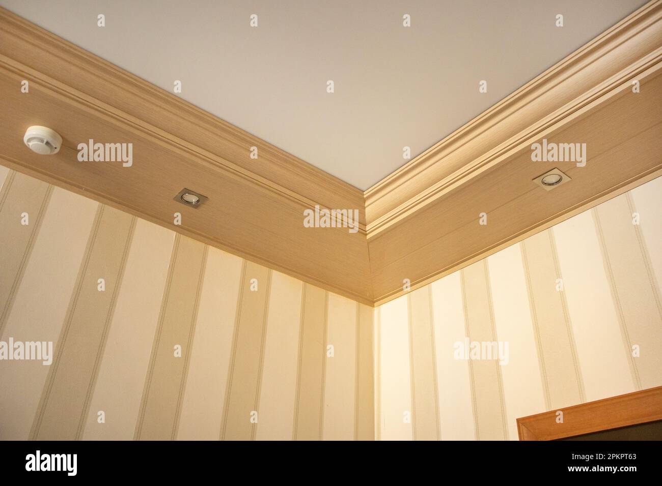 Part of the living room, corner of the wall from the ceiling, mounted ...