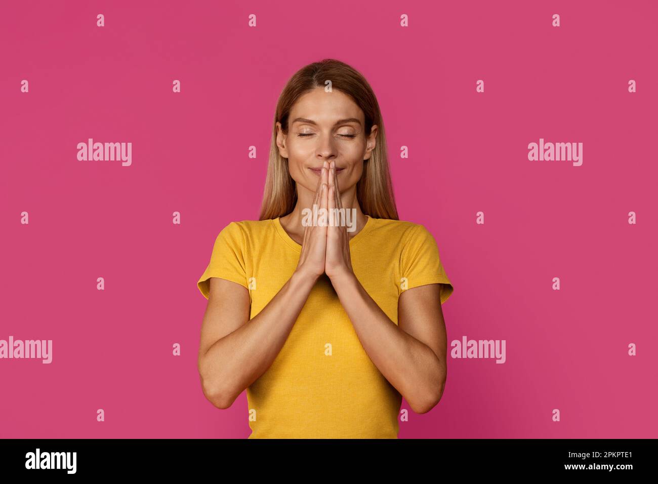 Cheerful blond mature woman hi-res stock photography and images - Alamy