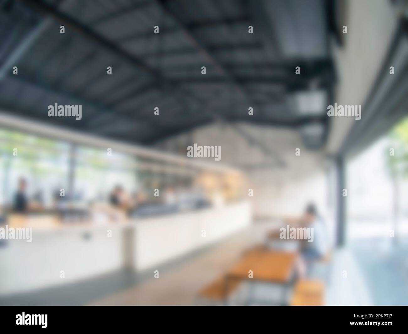 Blurred modern coffee shop or cafe or restaurant interior background ...