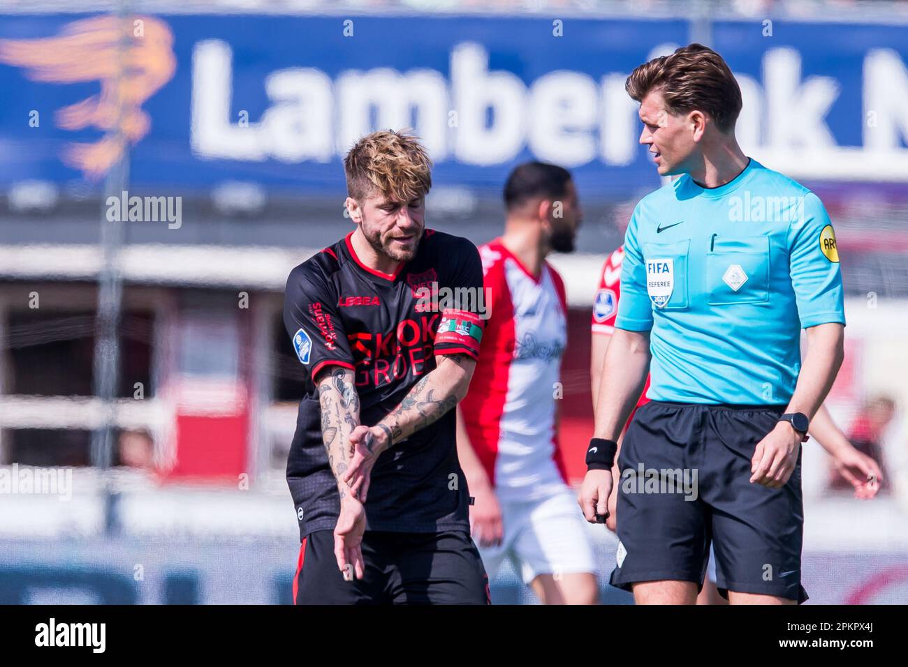 EMMEN - (lr) Lasse Schone of NEC Nijmegen, referee Joey Kooij during ... EMMEN - (lr) Lasse Schone of NEC Nijmegen, referee Joey Kooij during ...