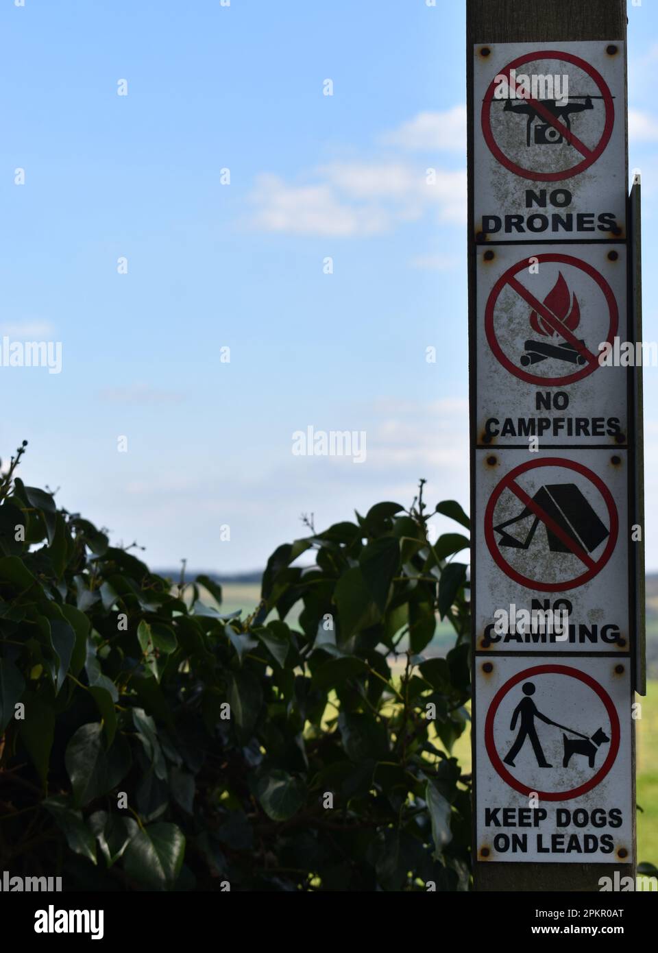 An assortment of signs restricting behaviour in the countryside, with ...