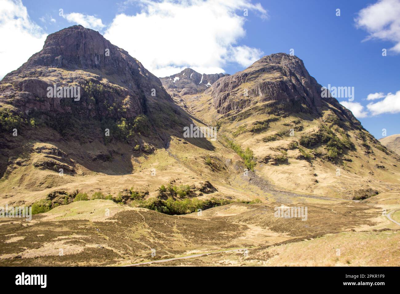 Imposing peaks of Bidean Nam Bian rising up over the Heathland of Glen ...