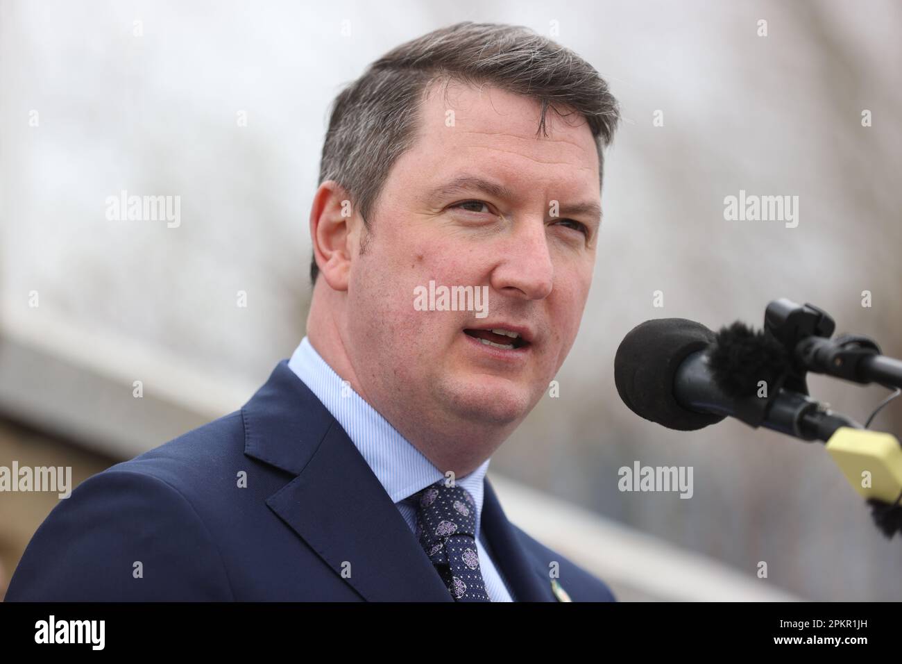 John Finucane speaking at Milltown Cemetery in Belfast, during a parade ...