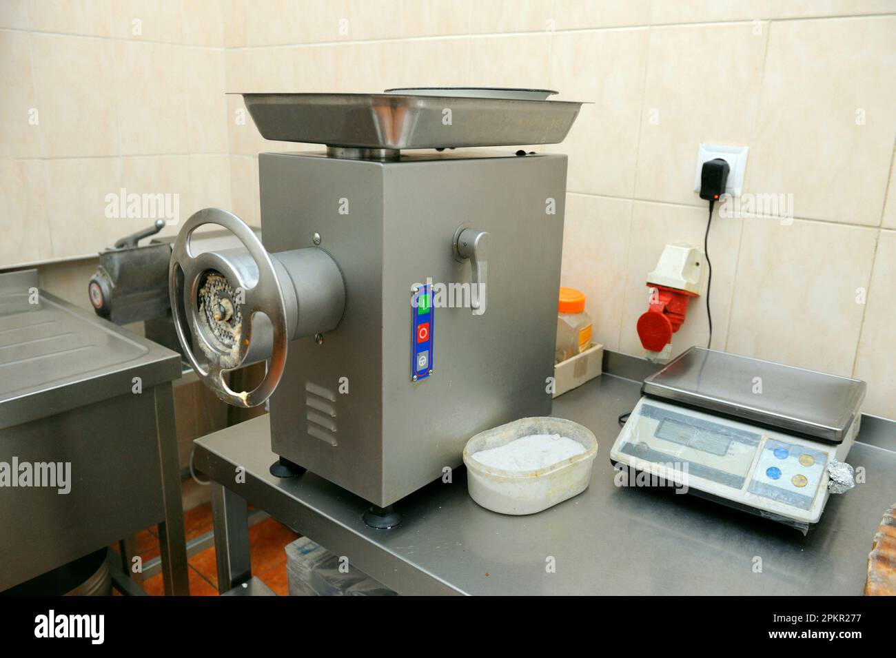 Pro metal blender, electronic scales set on a kitchen desk ready for ...