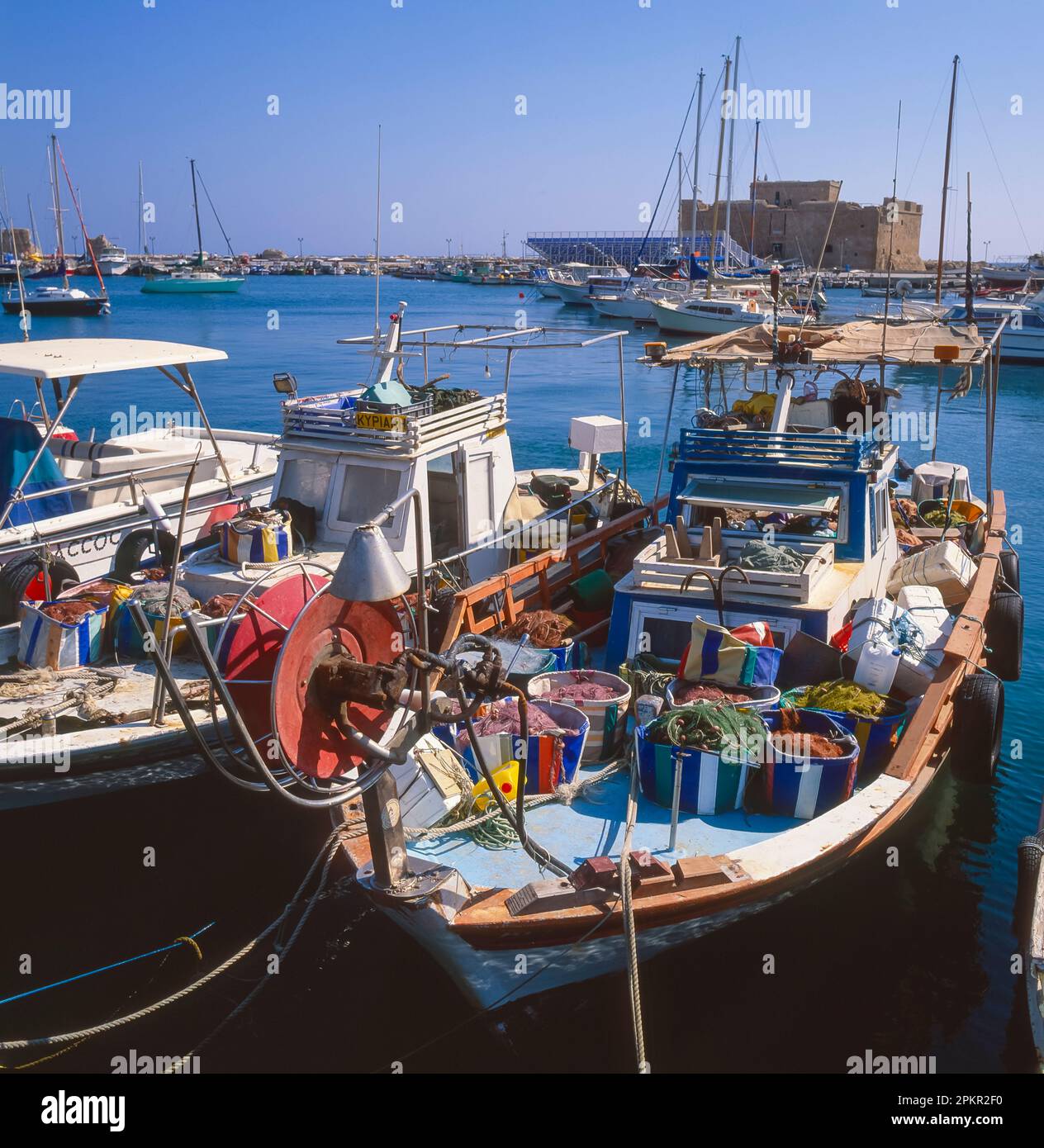 The historic Paphos harbour and small boat marina with the medieval ...