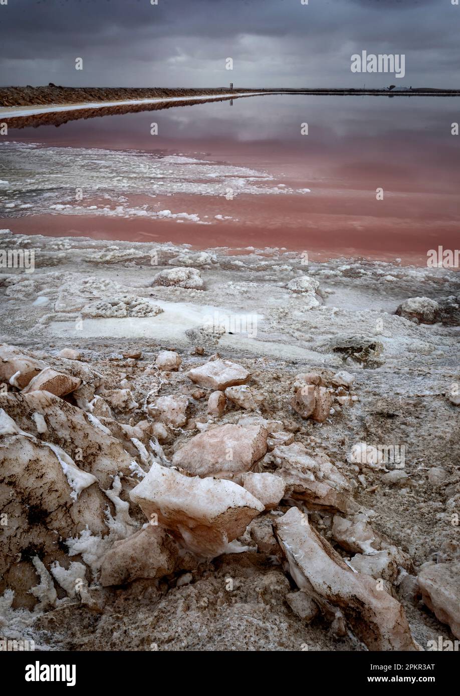 A landscape at the Walvis Bay salt Works and the city in the background ...