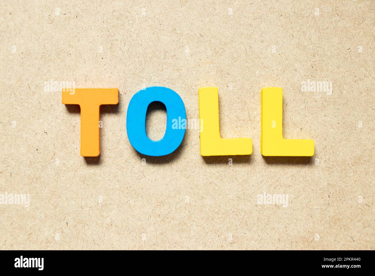 Color alphabet letter in word toll on wood background Stock Photo - Alamy