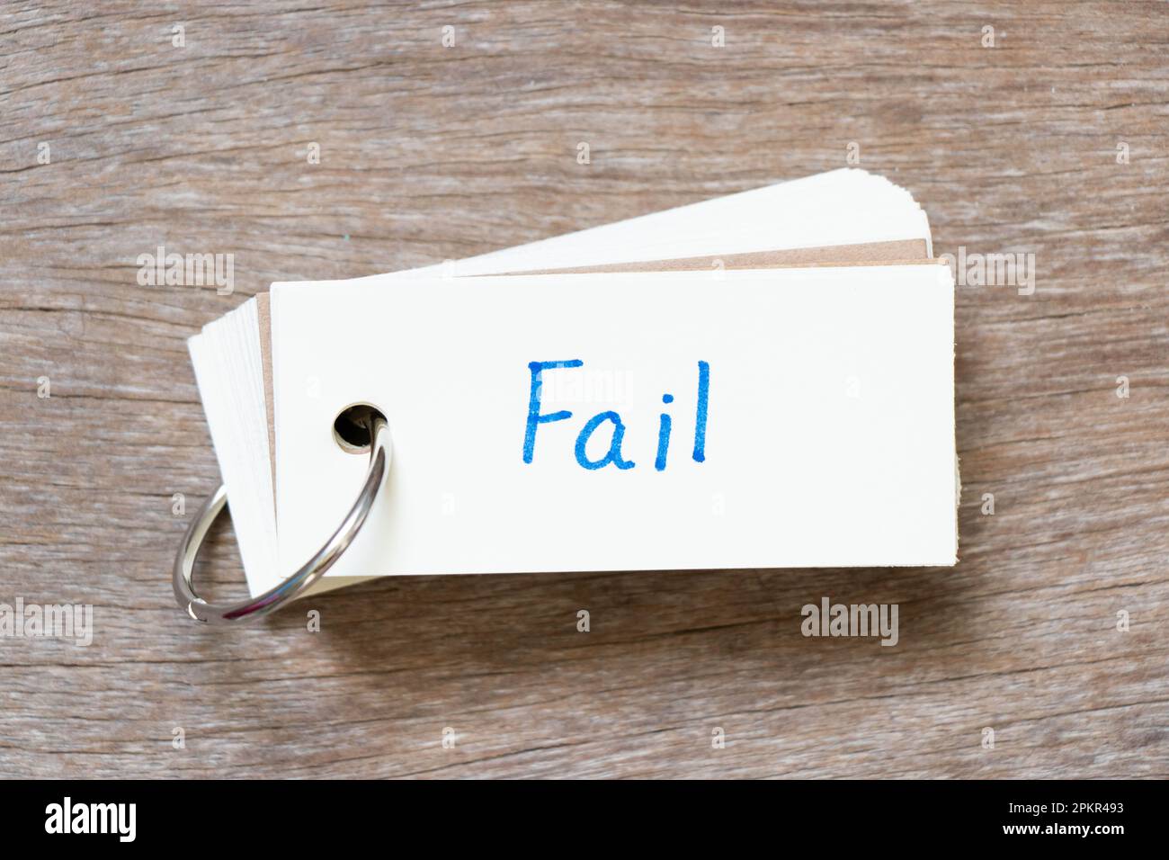 Flash card with handwriting in word fail on wood background Stock Photo ...