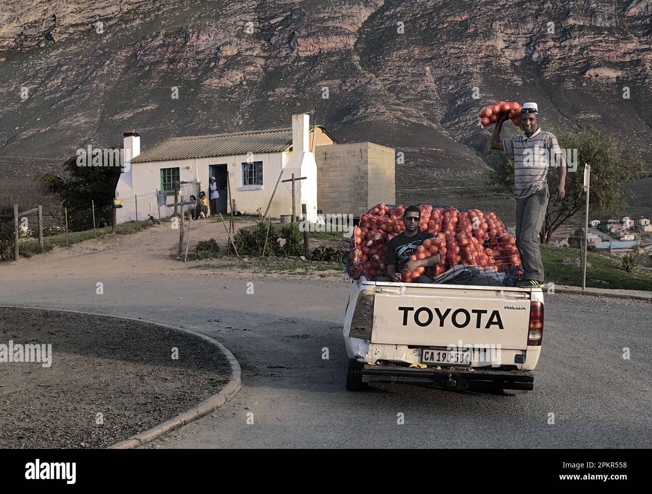 Ismail and Rifaat sell oranges to the residents of Newtown, a mostly ...