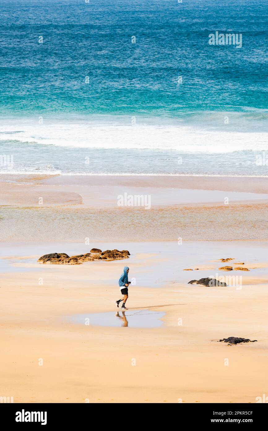 View from above, stunning aerial view of a person running on a ...