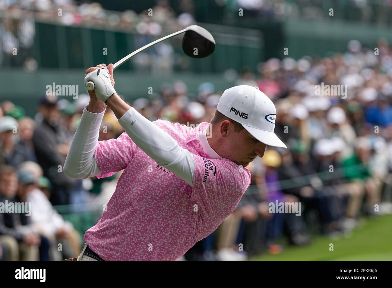 Sam Bennett hits his tee shot on the 14th hole during the weather ...