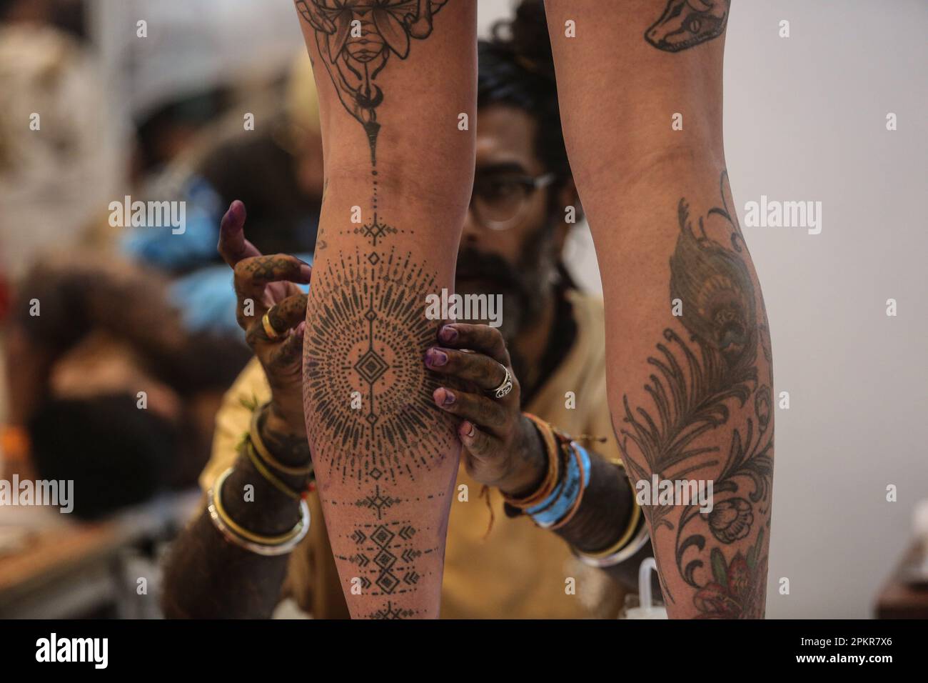 Lalitpur, Bagmati, Nepal. 9th Apr, 2023. A tattoo artist inks a ...