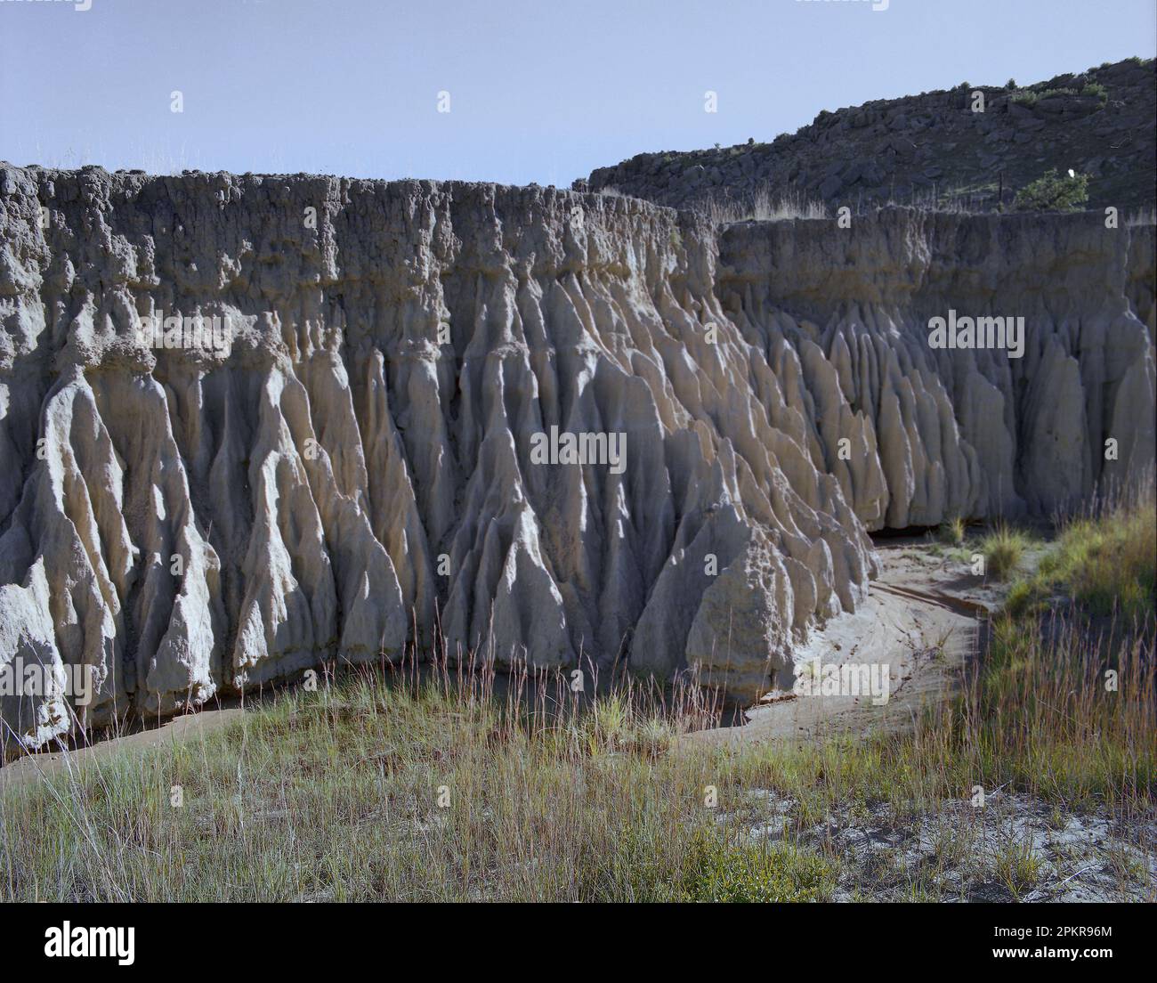 The soil eroded banks of a river in the Eastern Cape show bad farm and ...