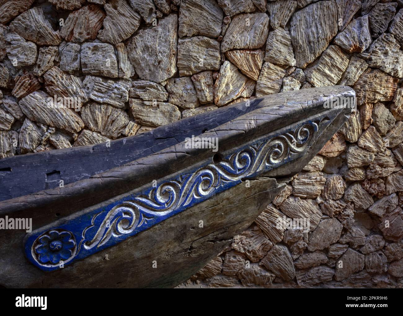 A wooden dugout with a coral brick wall in Shela town Stock Photo - Alamy