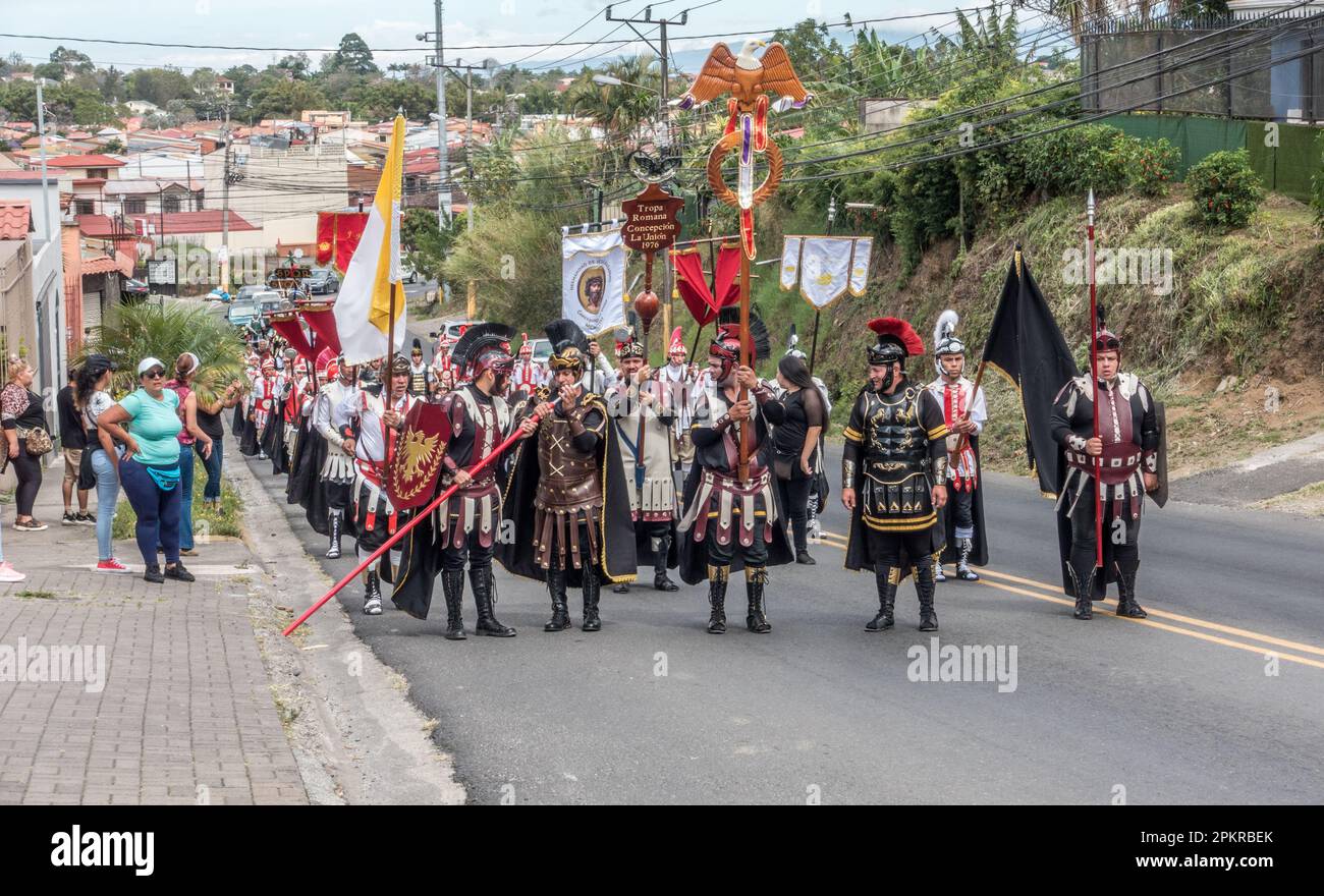 A pause in the Semana Santa procession to adjust the spear of a Roman ...