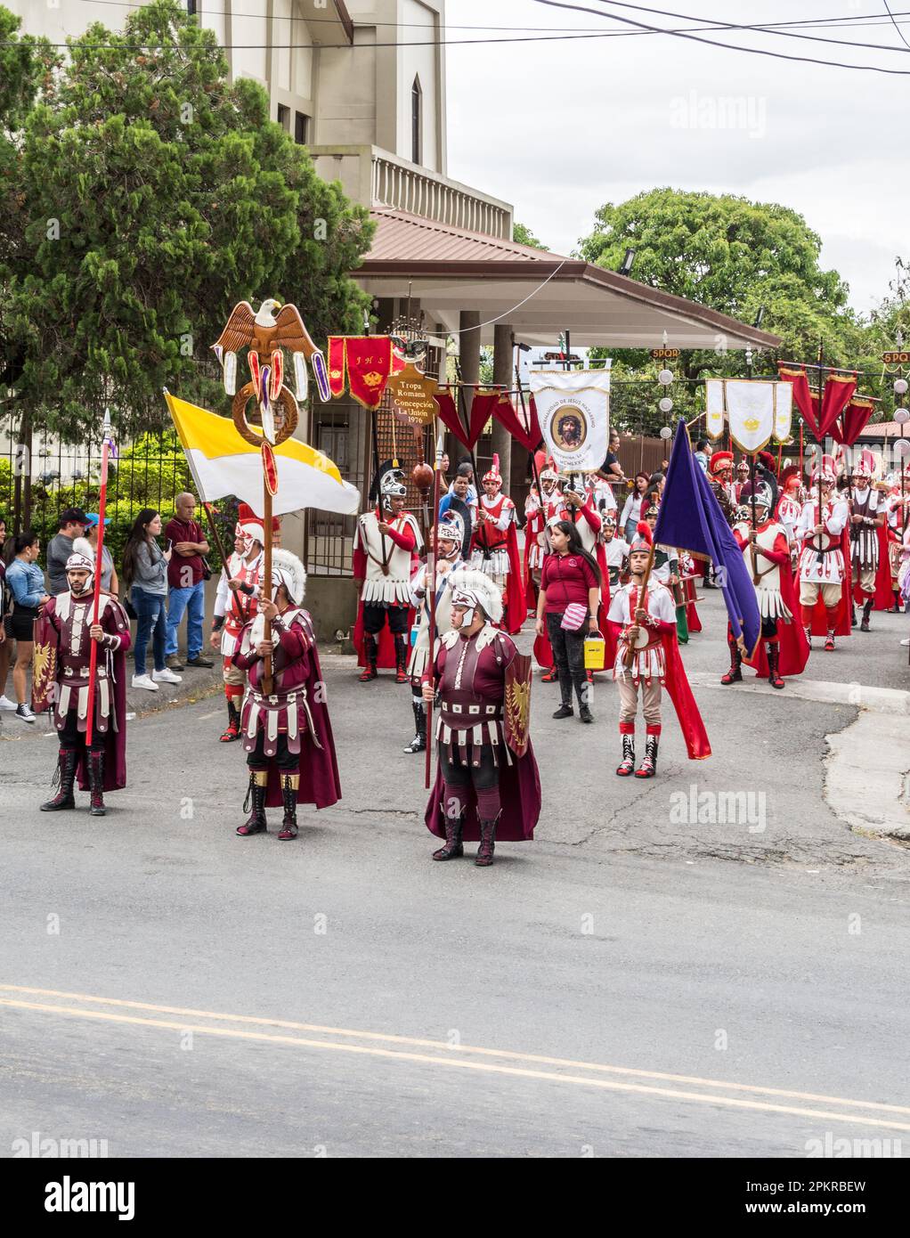 Colorful Semana Santa procession leaves church yard for parade through ...