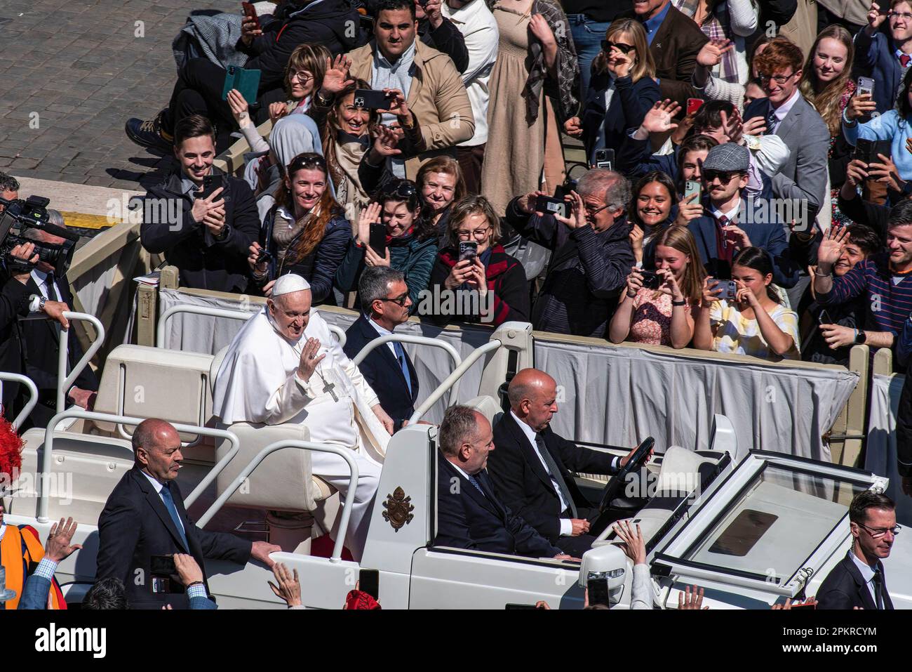 Pope Francis on board the Popemobile greeting the crowds of faithful on Easter Sunday. Thousands ...