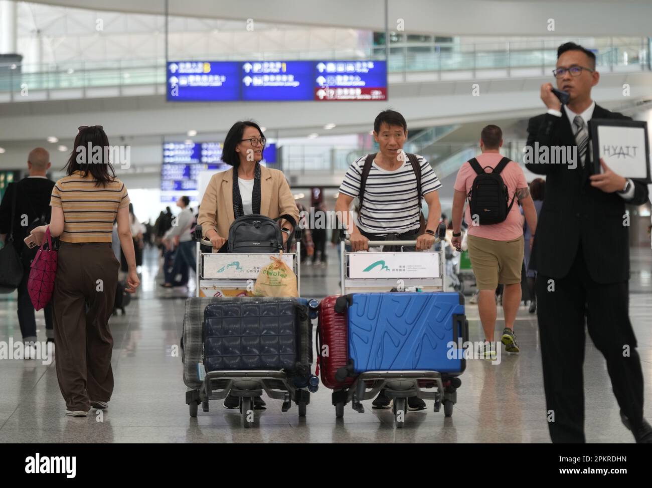 Inbound passengers arrive at the Arrival Hall of Hong Kong ...