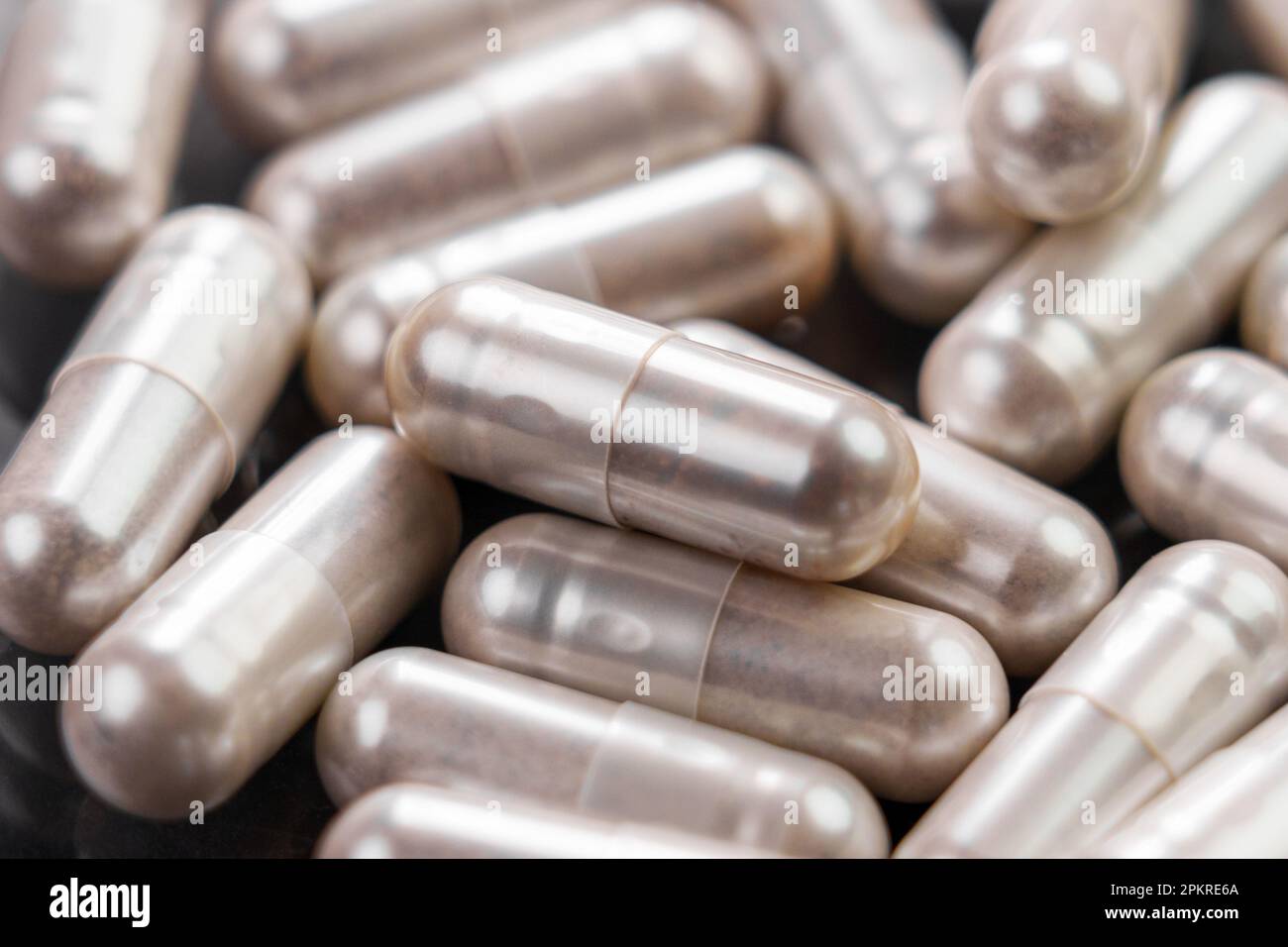 Narcotic drug pharmaceutical capsules close up Stock Photo - Alamy