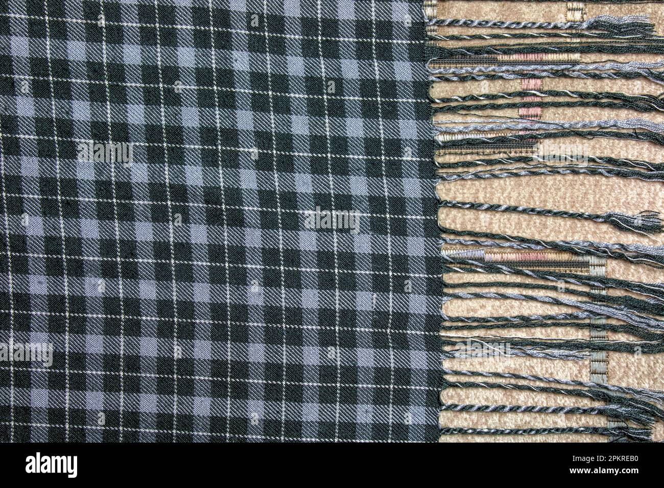 Texture of checkered white, blue wool. Fringed hem. Checkered blue and ...