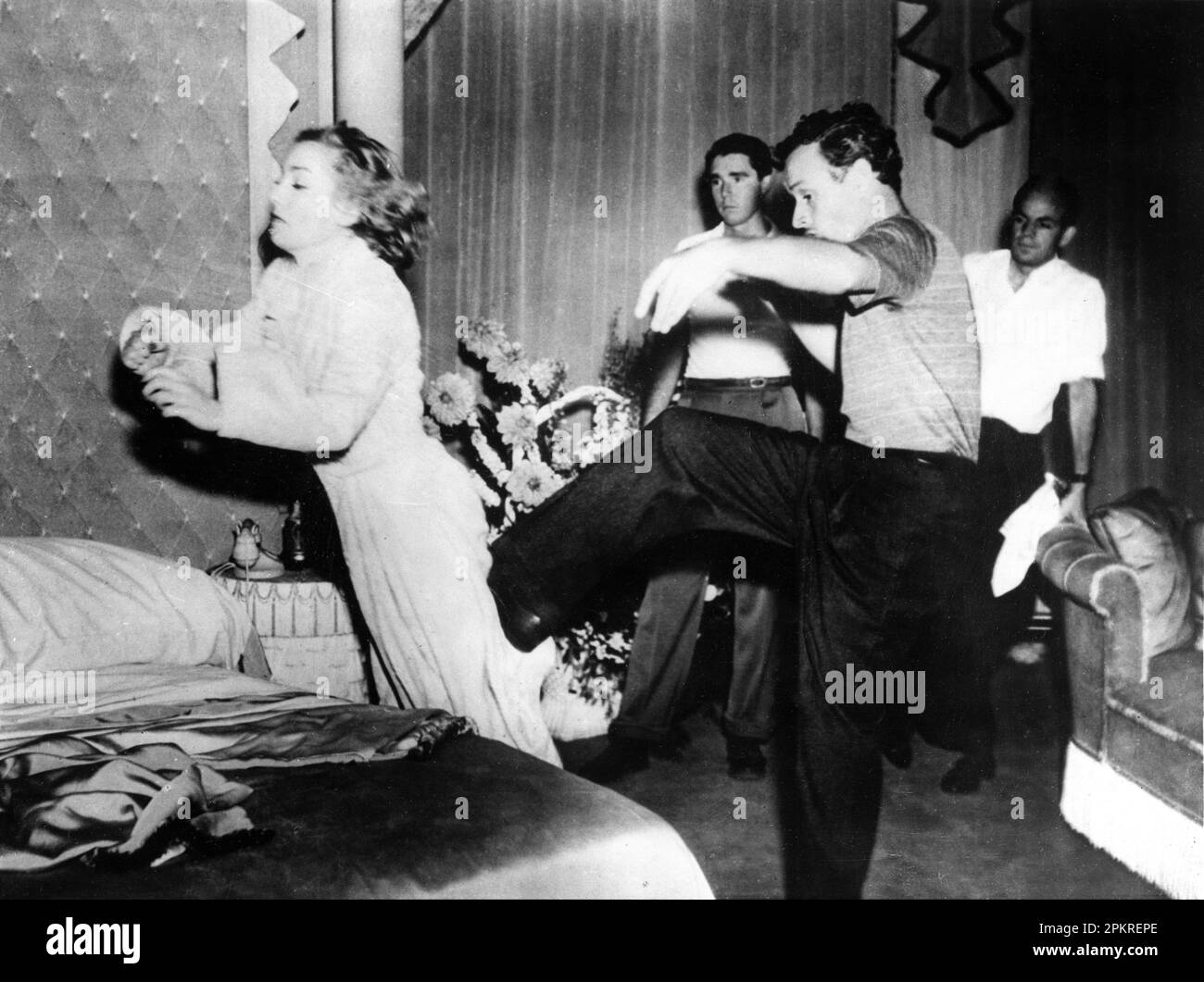 CAROLE LOMBARD and Director WILLIAM WELLMAN on set candid during ...
