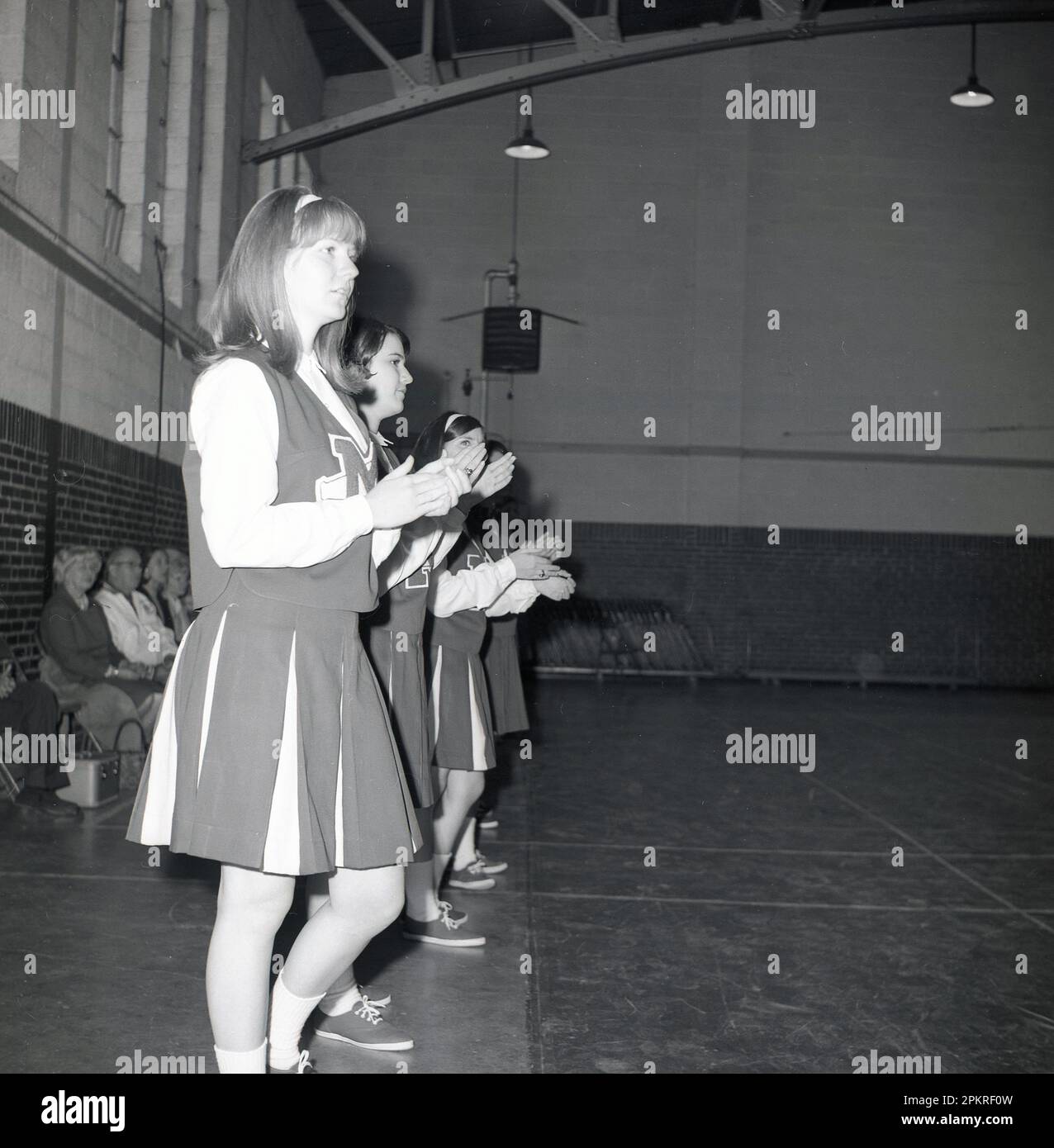1965 Historial Schoolgirls Cheerleaders Inside A Sports Hall Supporting Their College