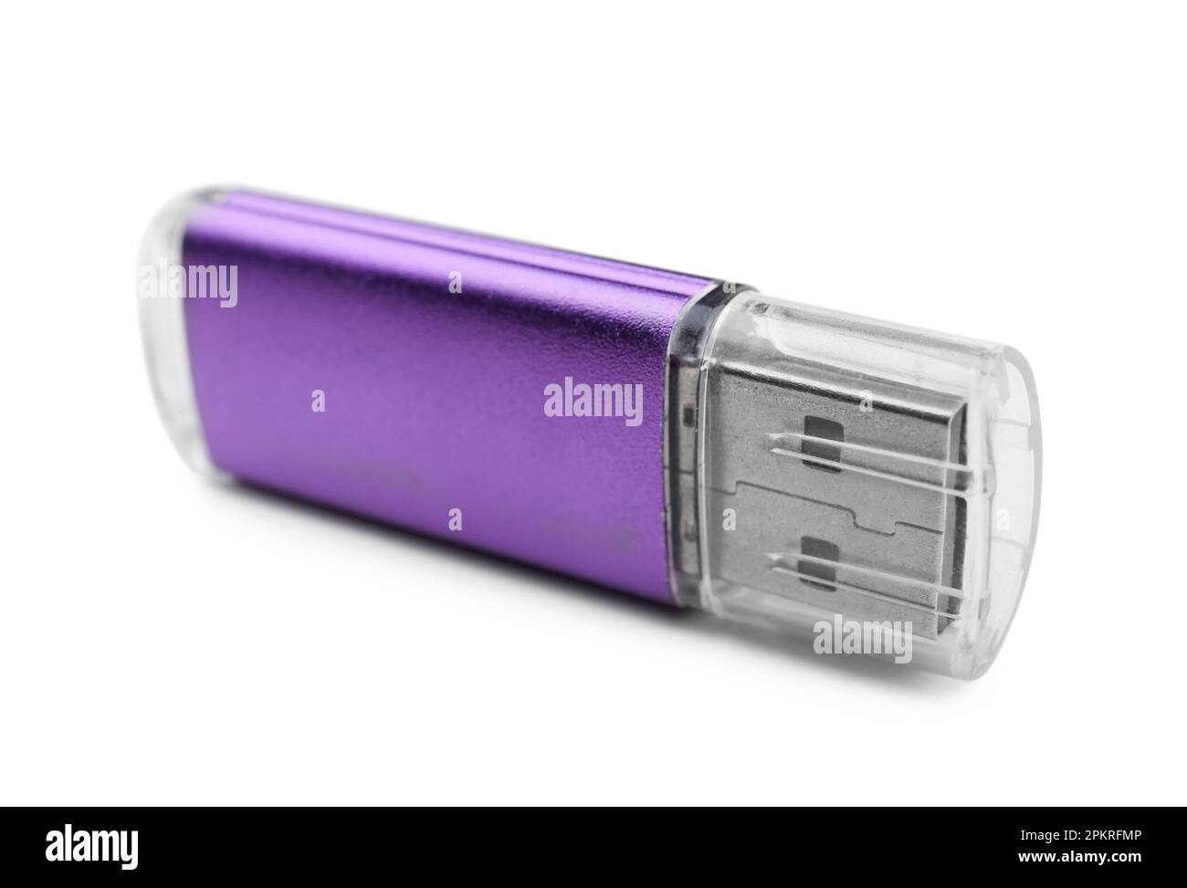Purple USB flash drive on white background Stock Photo - Alamy