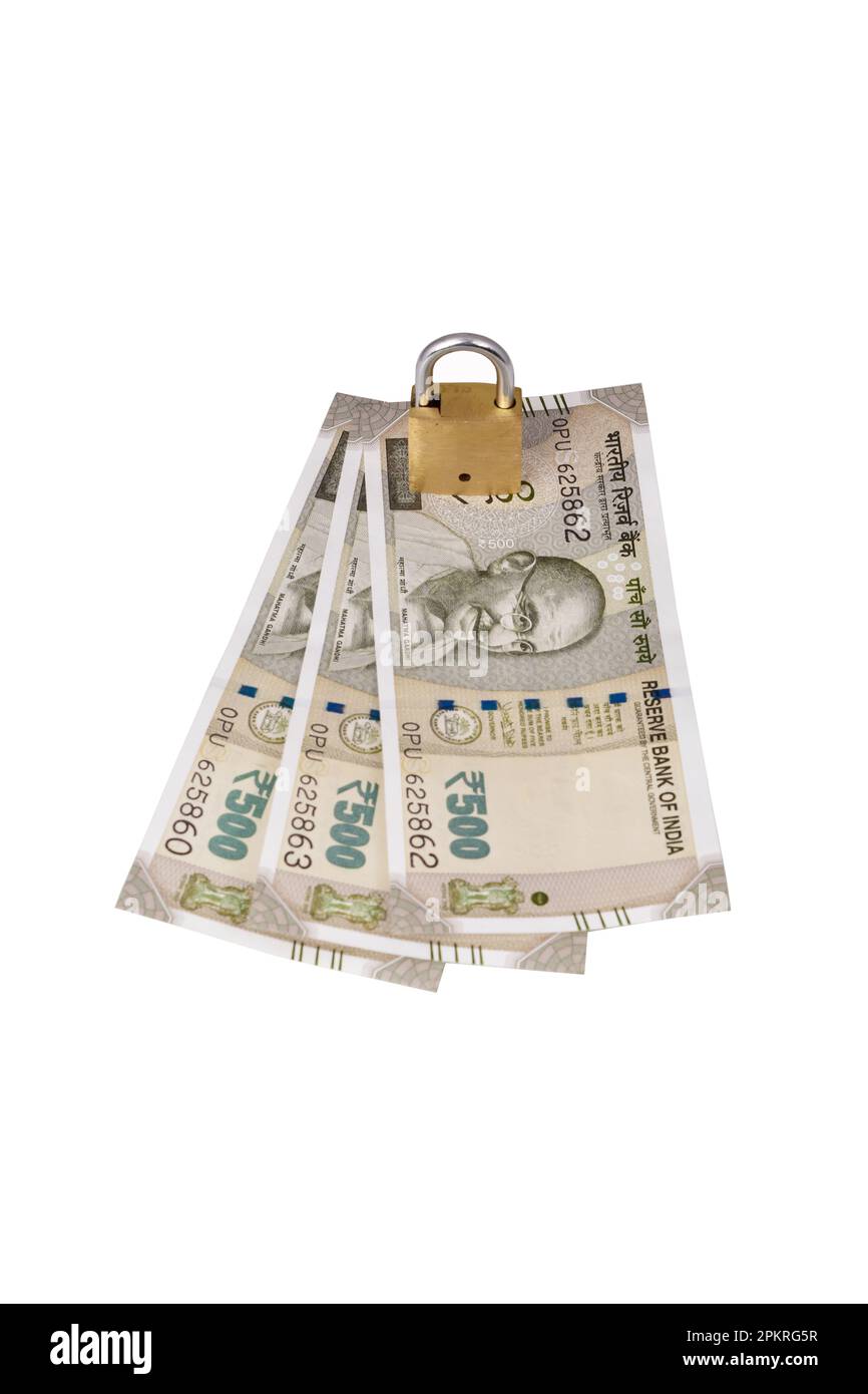 Lock with indian currency isolated on white background with clipping ...