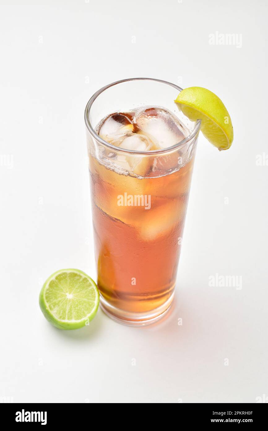 Glass of ice tea on white background Stock Photo - Alamy