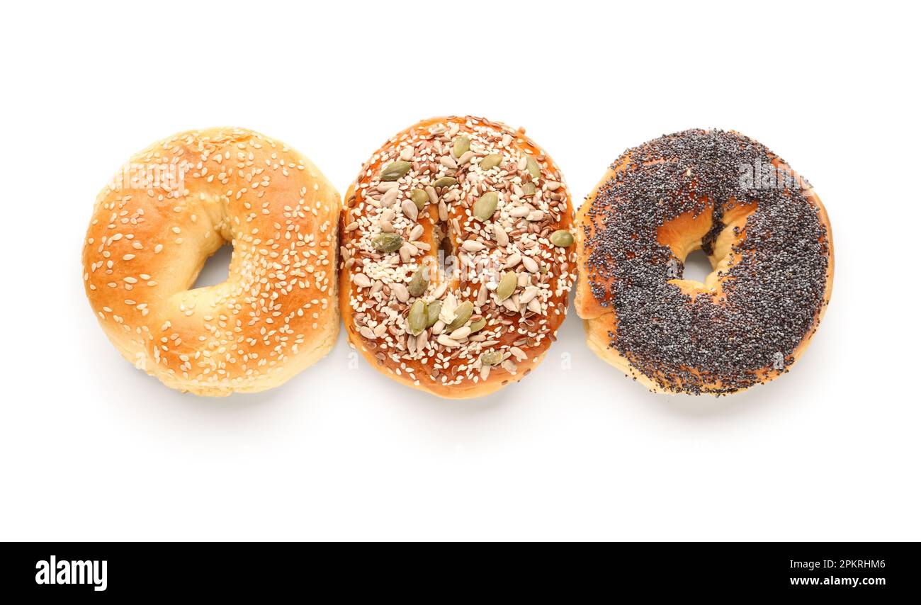 Tasty bagels isolated on white background Stock Photo - Alamy