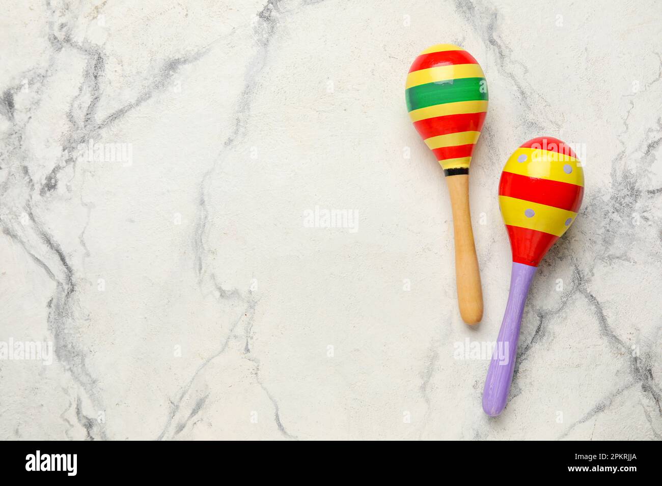 Mexican maracas on grunge background Stock Photo - Alamy