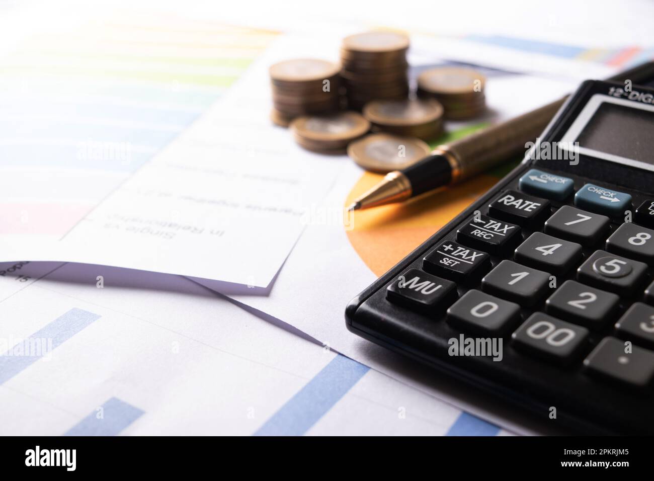 Calculator with pen and documents at office table Stock Photo - Alamy
