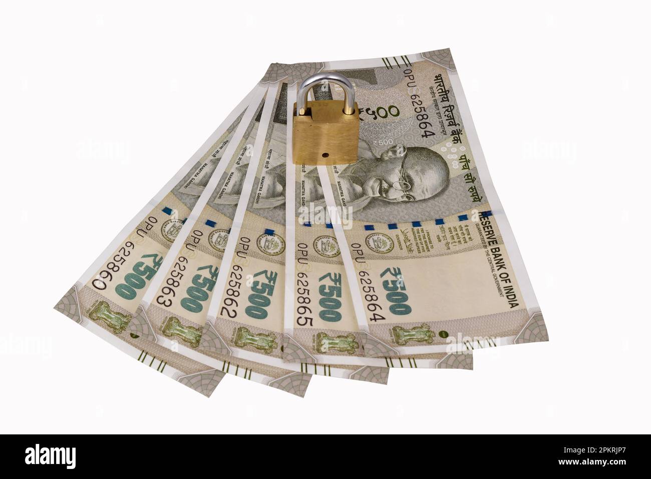 Padlock with indian currency note isolated on white background, money ...