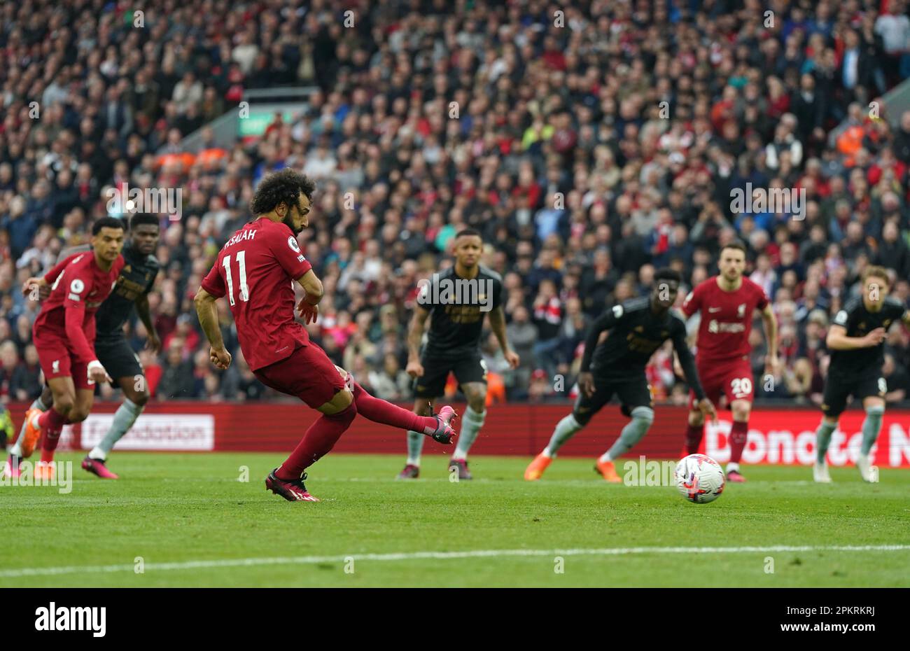 Liverpool's Mohamed Salah hits the post with his penalty during the ...