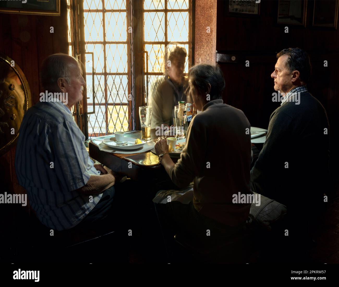 People having lunch in the bar of the Himeville Arms Hotel Stock Photo ...