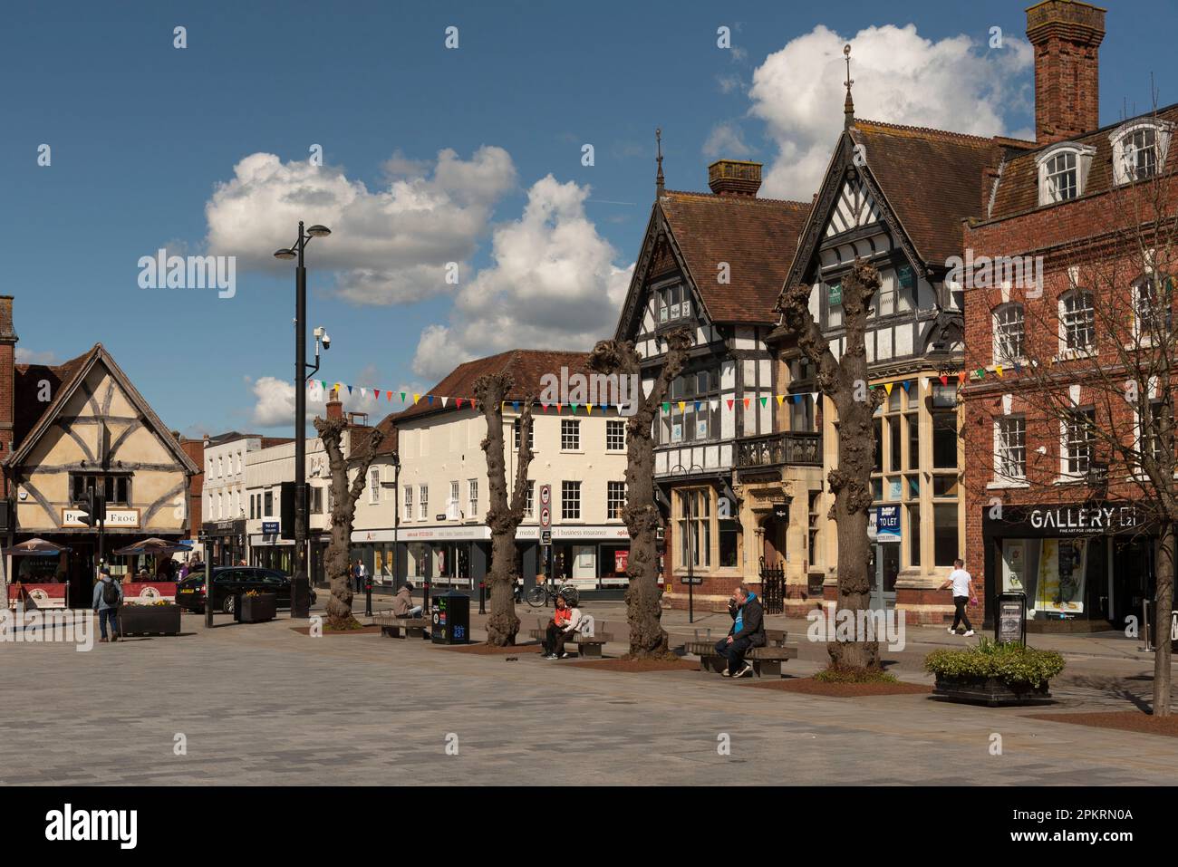 Salisbury, Wiltshire, England, UK. 2023. People walk on Market Place in ...