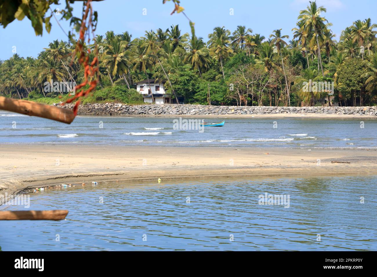 the lake and backwaters behind Dharmadam beach in Kannur, Kerala in ...