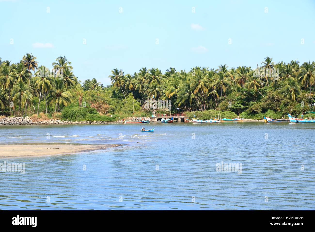 the lake and backwaters behind Dharmadam beach in Kannur, Kerala in ...