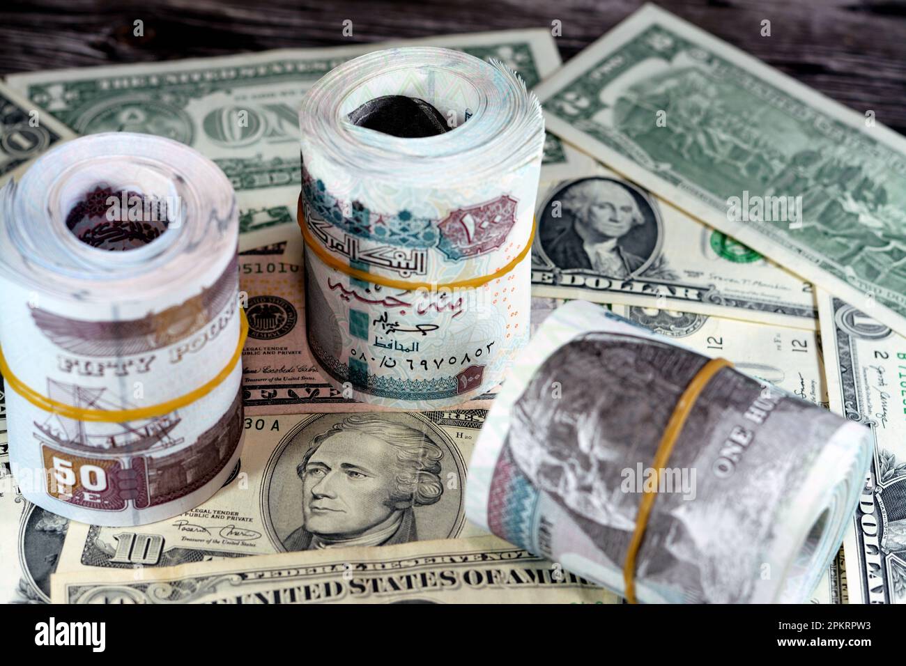 Rolls of Egypt money banknote bills of 100 and 50 EGP LE one hundred ...