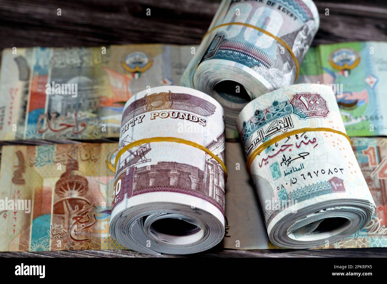Rolls of Egypt money banknote bills of 100 and 50 EGP LE one hundred ...
