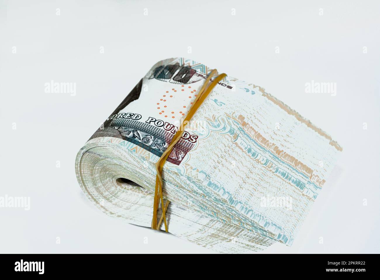 Folded 100 EGP LE one hundred Egyptian pounds cash money bills rolled ...