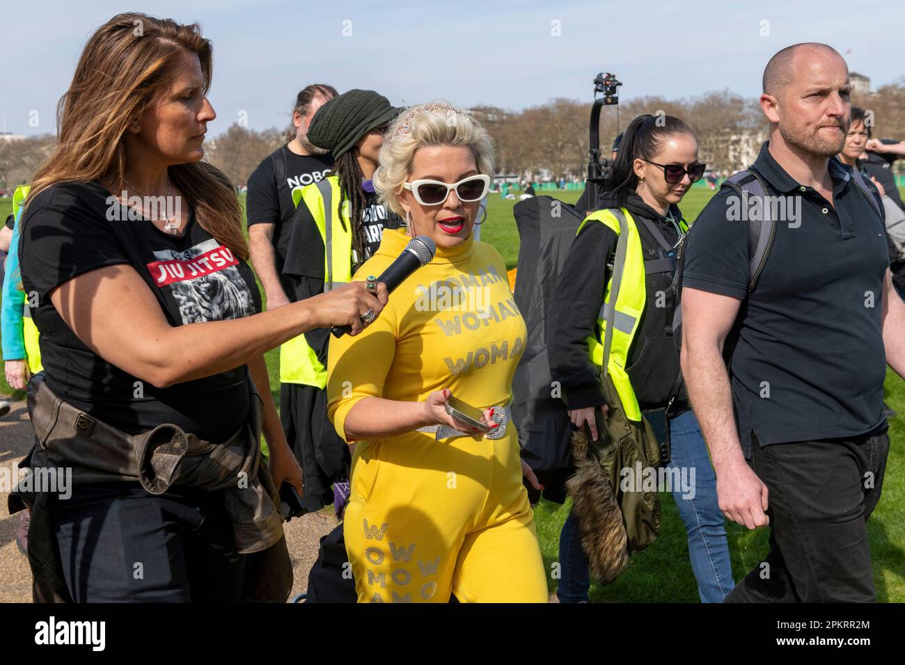 Kellie-Jay Keen-Minshull (yellow jumpsuit), also known as Kellie-Jay ...