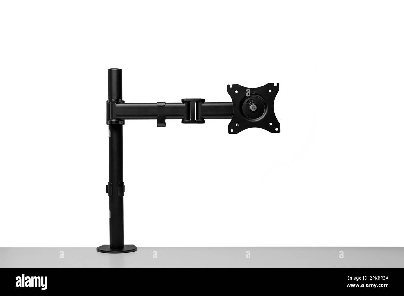 Desktop monitor mount isolated on white background Stock Photo - Alamy