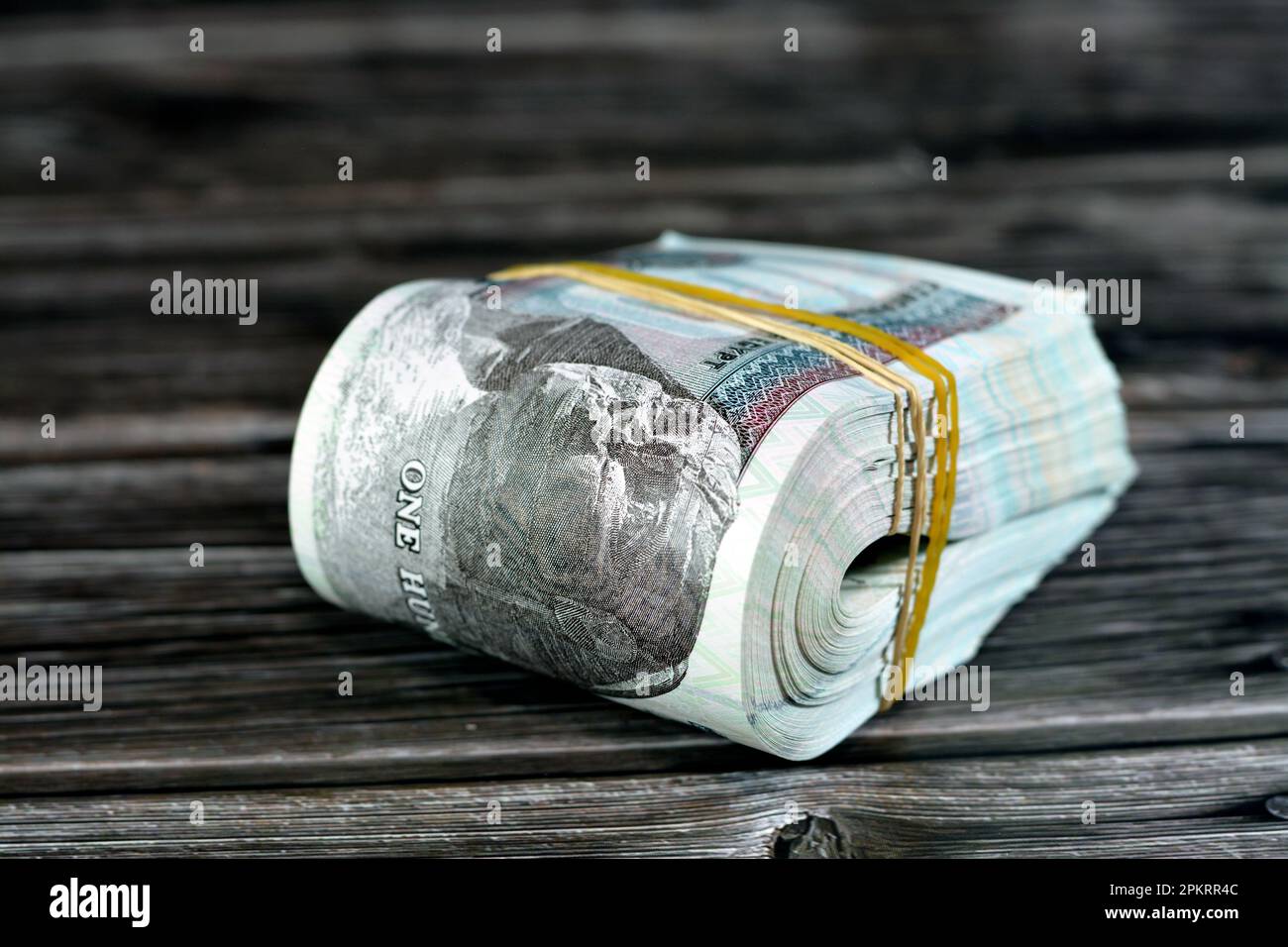 Folded 100 EGP LE one hundred Egyptian pounds cash money bills rolled ...