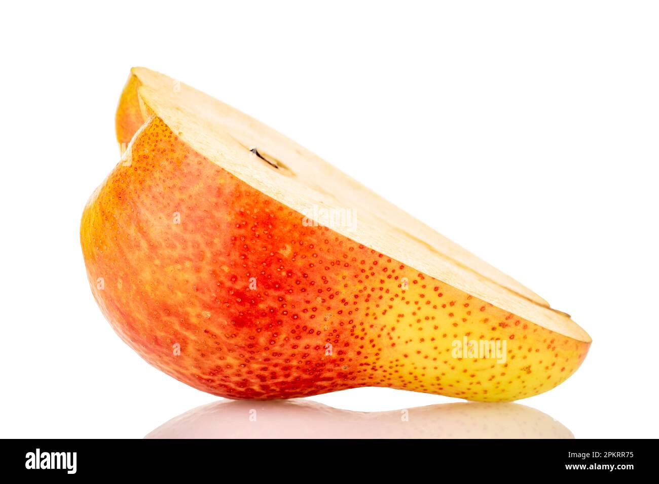 One half ripe pear, close-up, on a white background Stock Photo - Alamy