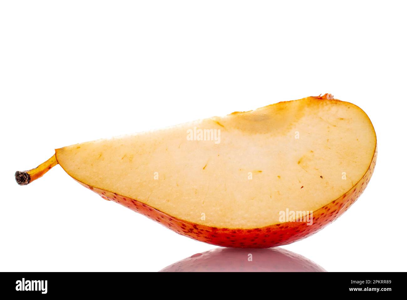 Slice of juicy organic pear, close-up, on a white background Stock ...