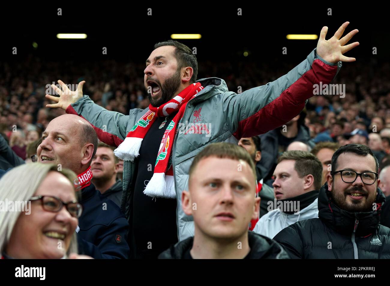 A Liverpool fan celebrates after their side's second goal during the ...